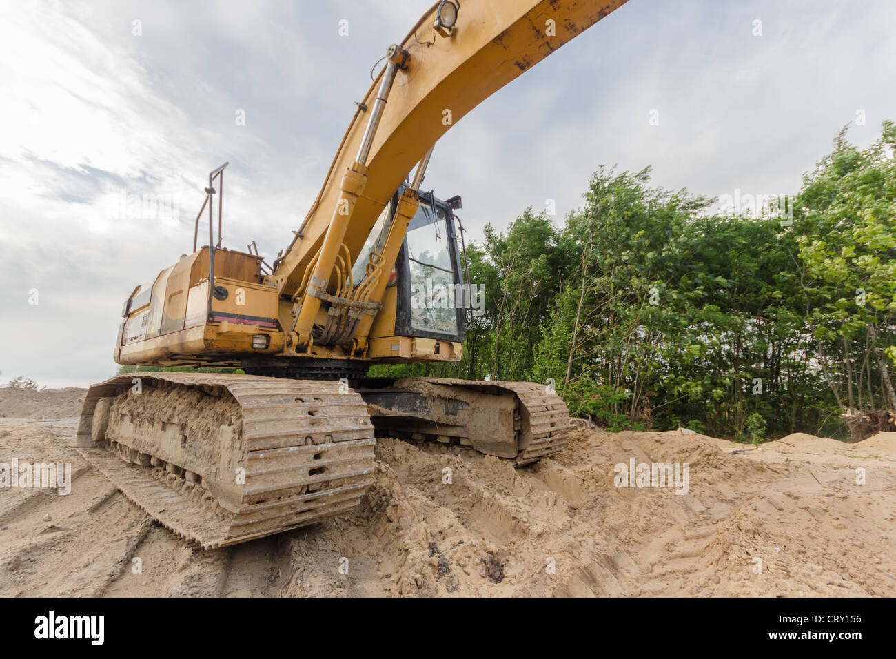 digger, heavy duty construction equipment parked at work site Stock ...