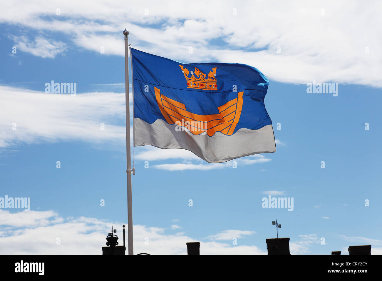 fluttering flag of Helsinki against blue sky Stock Photo - Alamy