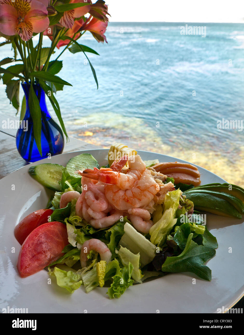 Healthy simple fresh seafood prawn salad on restaurant table with ...