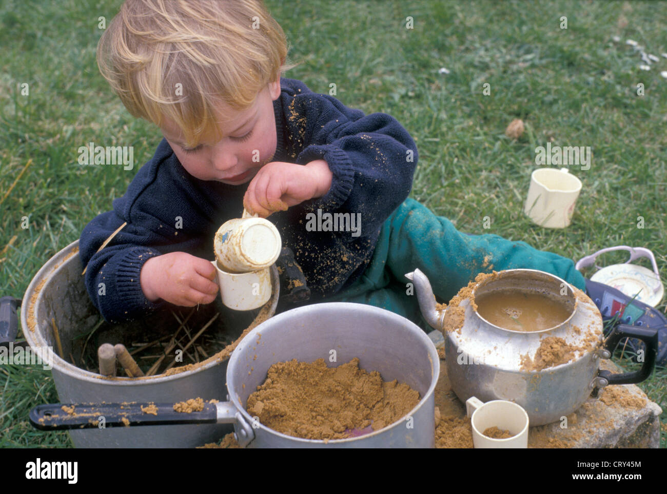 child engaged in messy play Stock Photo - Alamy