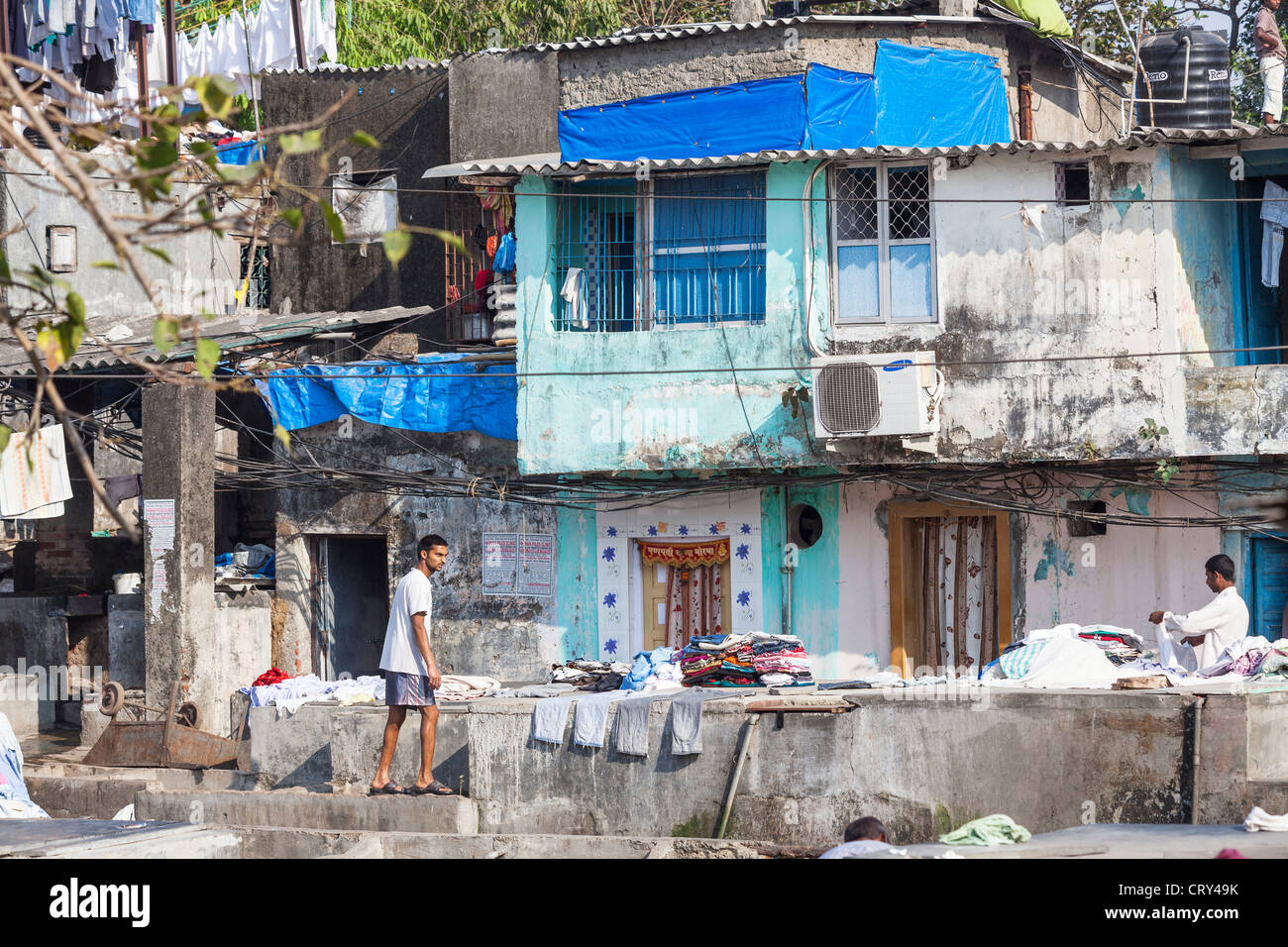 Dhobi wallahs working at washing and laundry, Dhobi Ghat, Mumbai, India ...
