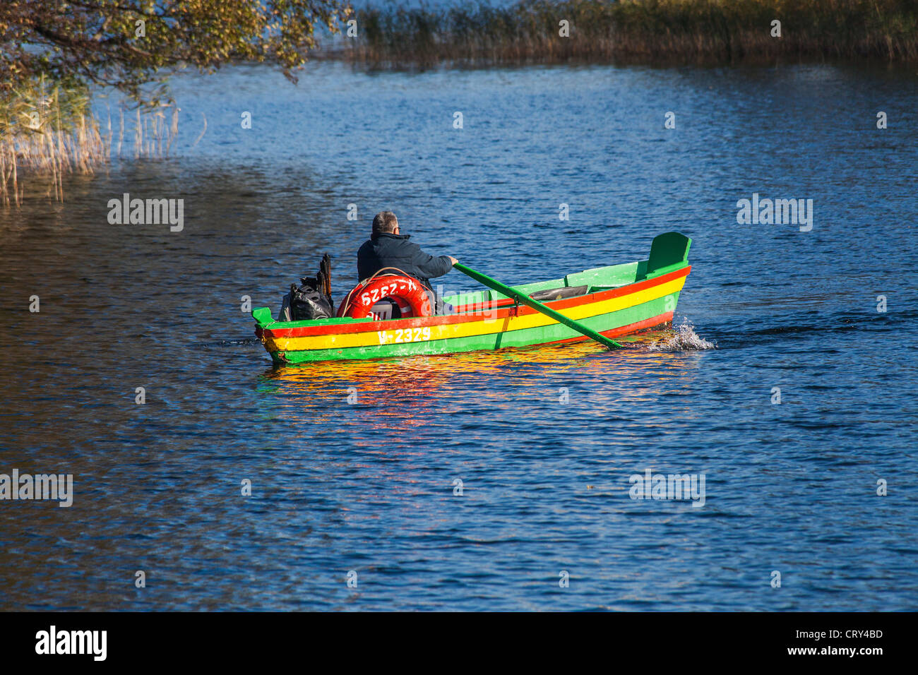 Brightly coloured rowing boat hi-res stock photography and images - Alamy