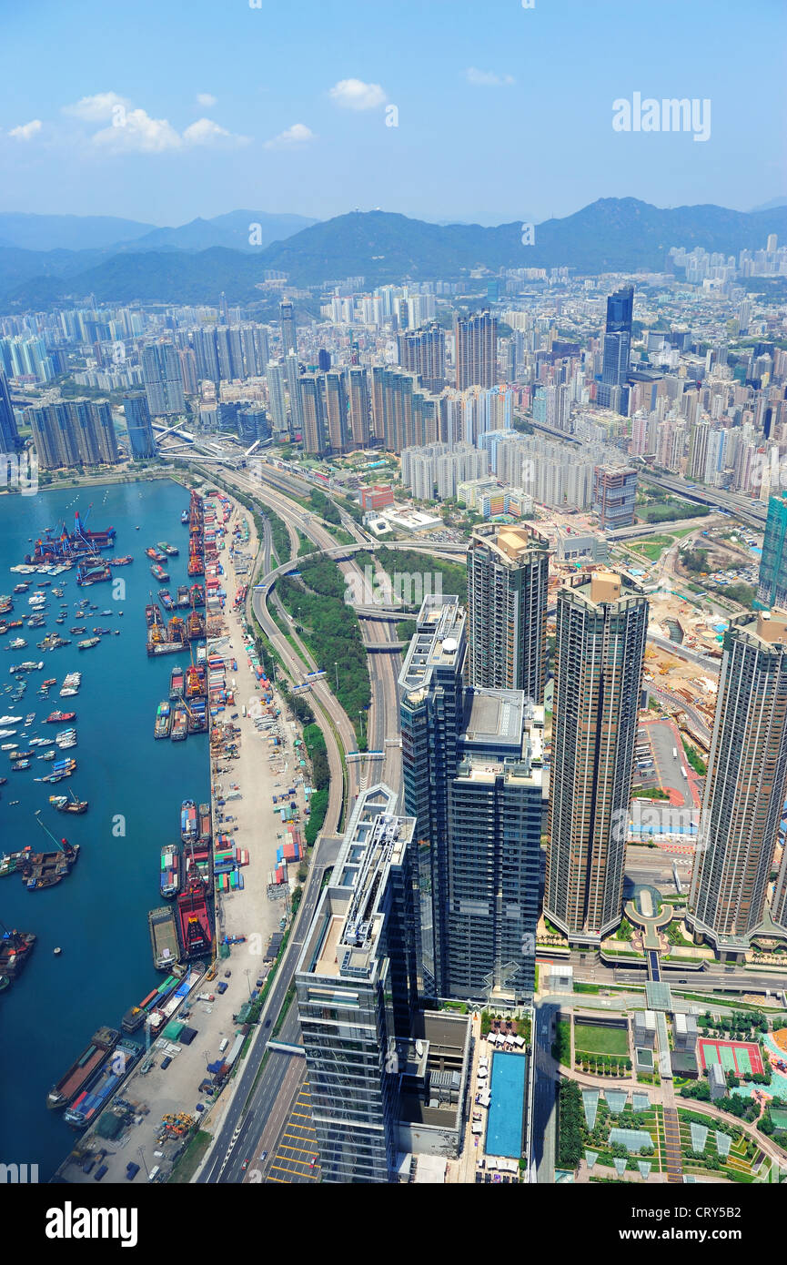 Hong Kong aerial view panorama with urban skyscrapers boat and sea ...