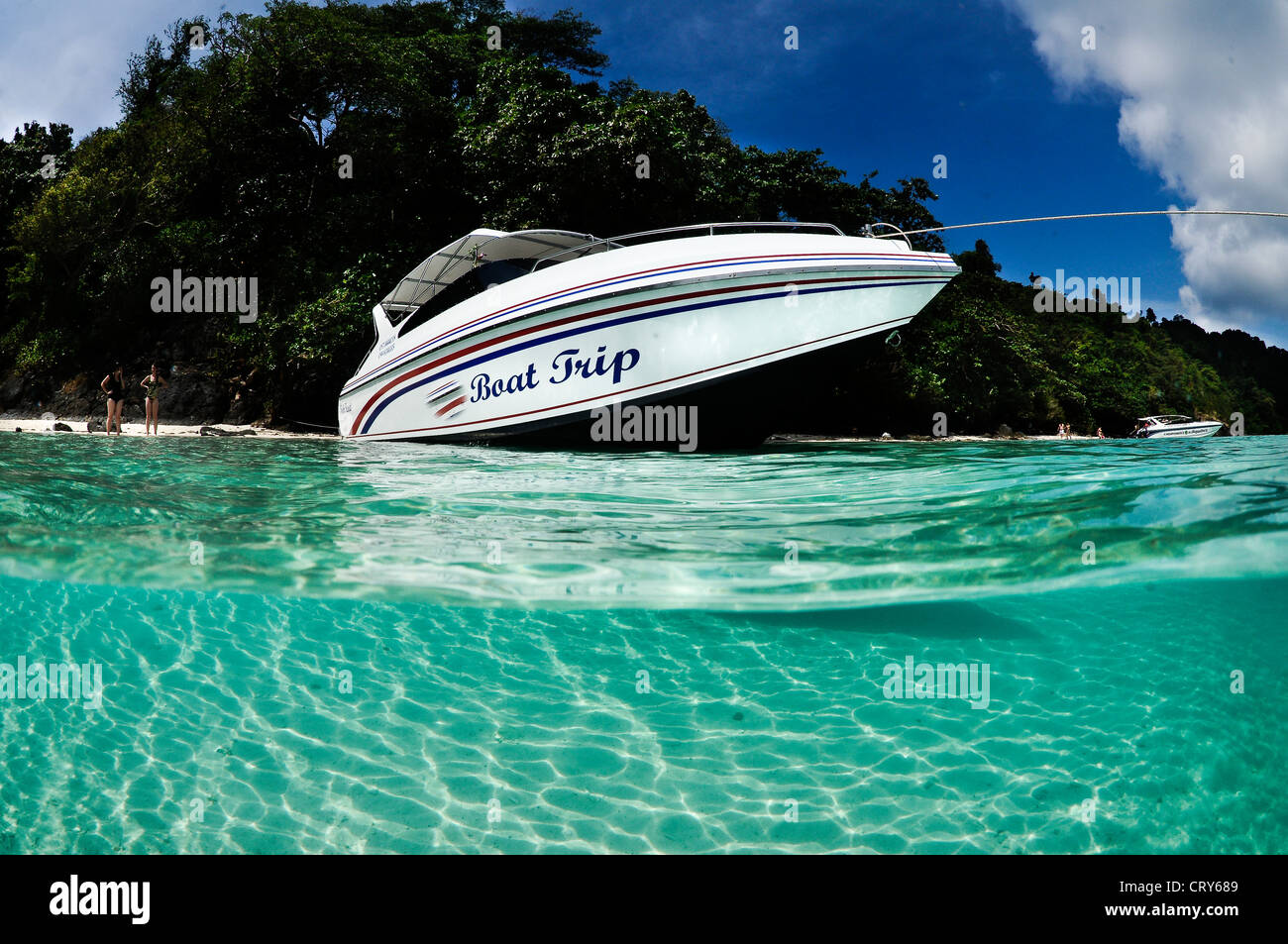 speed boat on a beach in Thailand Stock Photo - Alamy