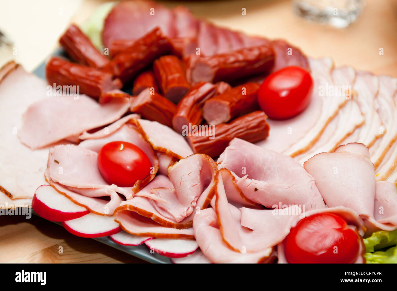 platter of cold cuts and sausages with ham and tomatoes Stock Photo - Alamy