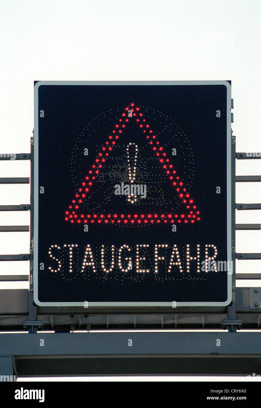 Illuminated signs for risk of congestion Stock Photo - Alamy
