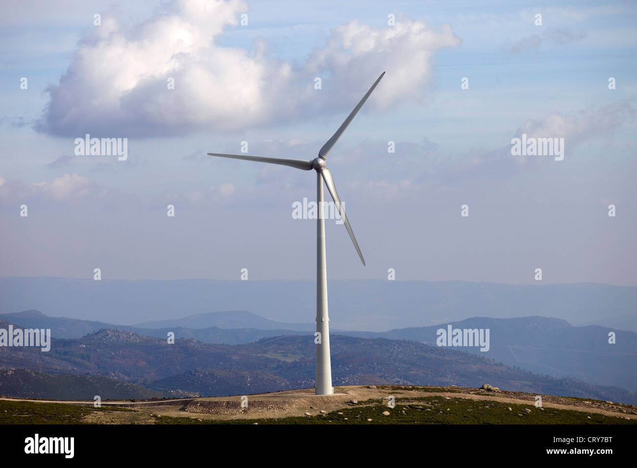 white wind turbine in the top of the mountain Stock Photo - Alamy