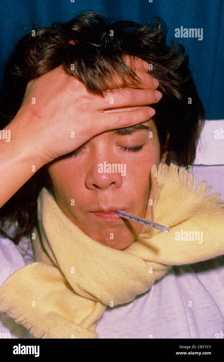 WOMAN WITH FEVER Stock Photo - Alamy