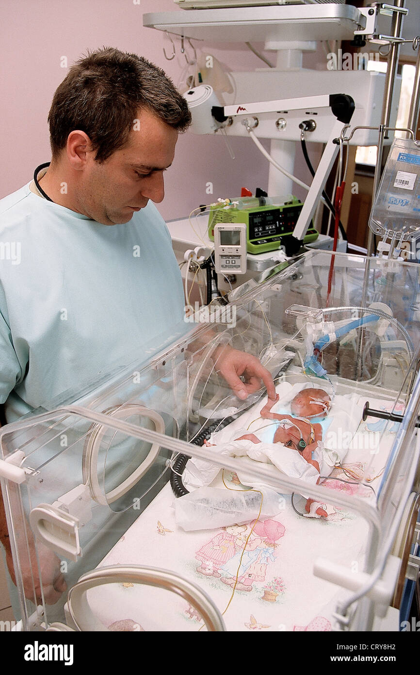 FATHER AND PREMATURE BABY Stock Photo - Alamy