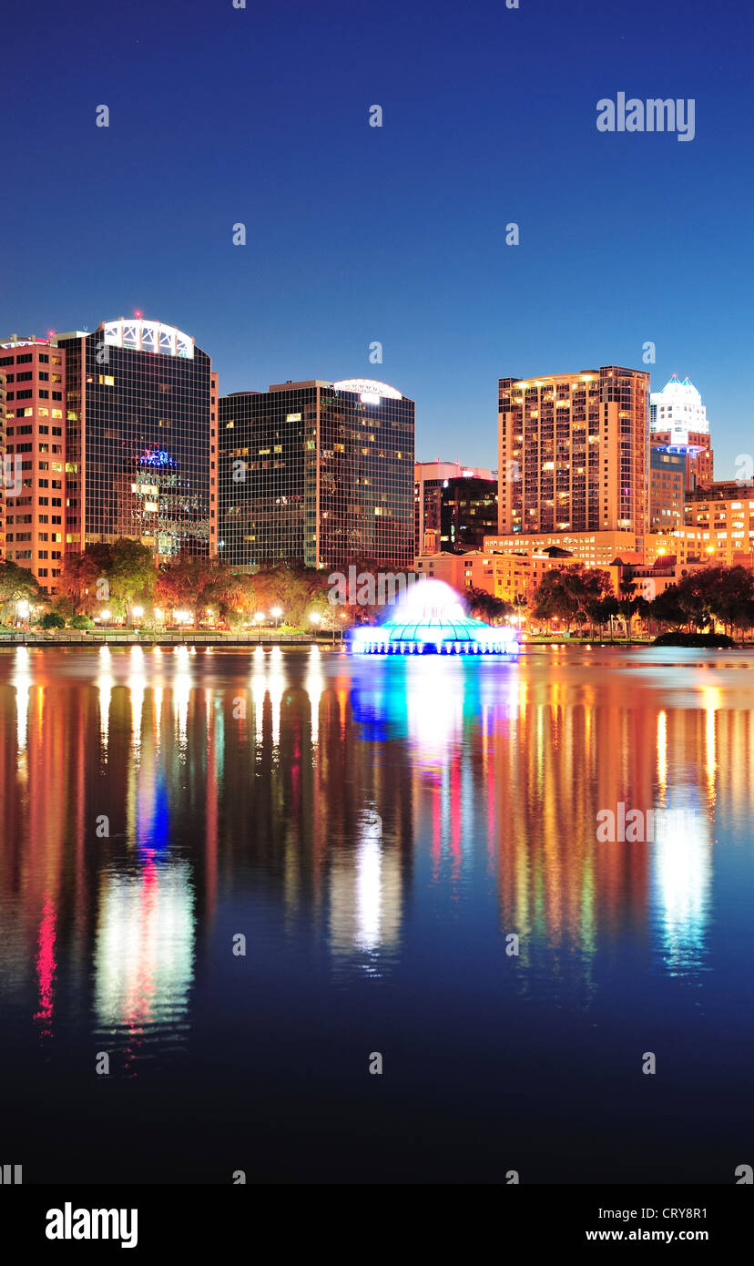 Orlando downtown skyline panorama over Lake Eola at night with urban ...