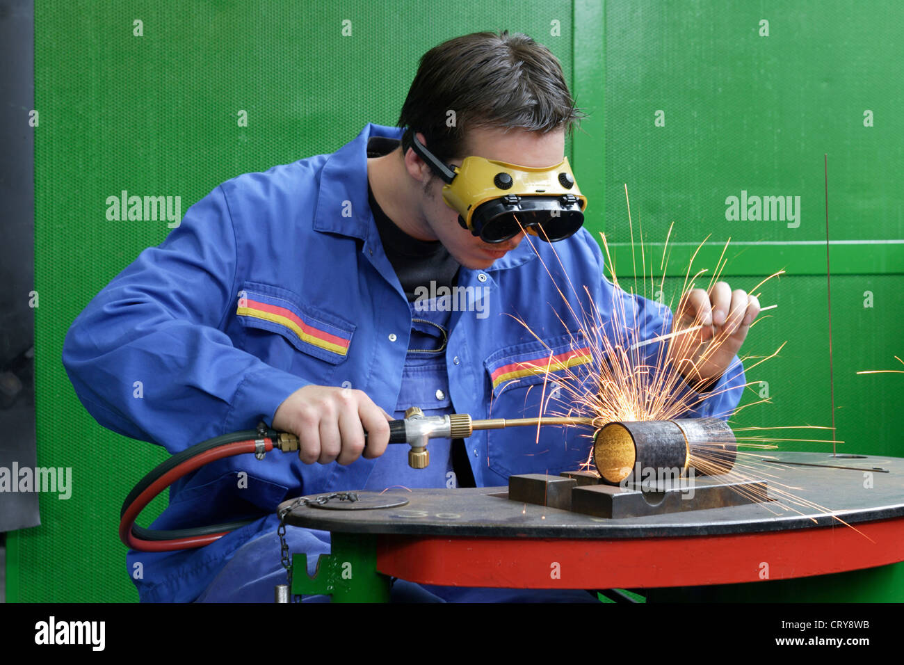 Apprentice plant mechanic with welding course Stock Photo - Alamy