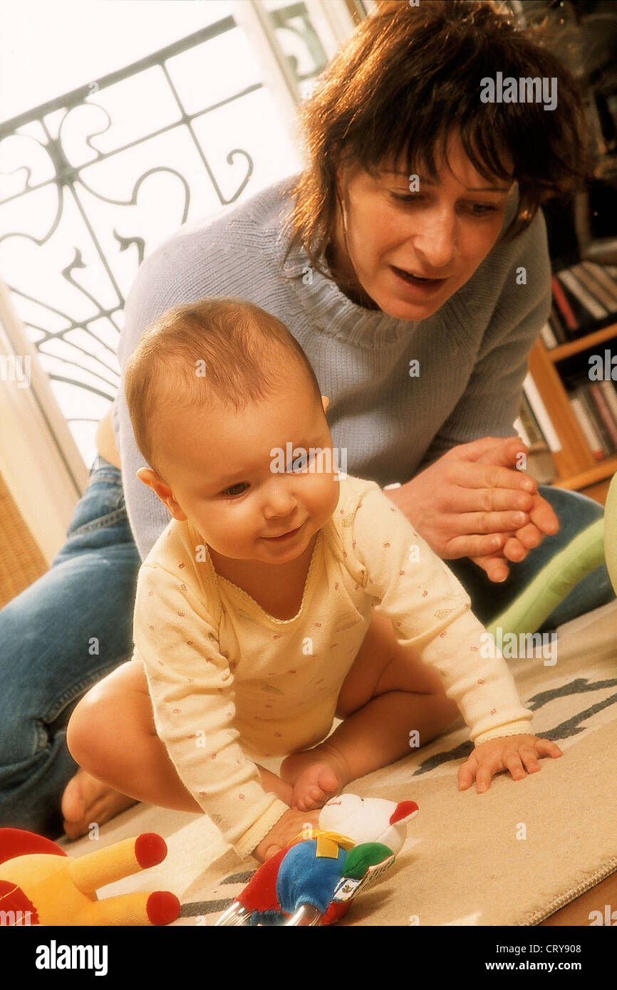Mature woman babysitting 2 children hi-res stock photography and images ...