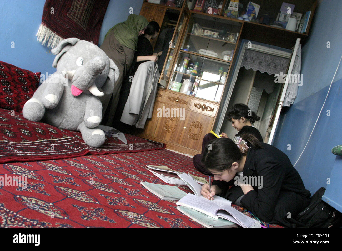 Afghan, young schoolgirl with homework Stock Photo - Alamy