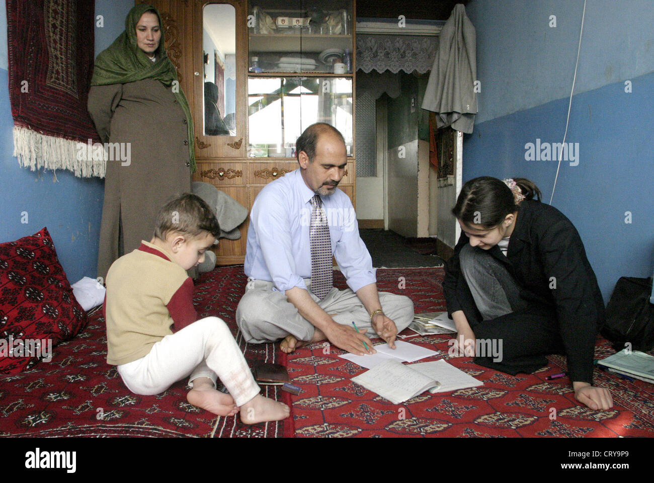 Afghan, young schoolgirl with homework Stock Photo - Alamy