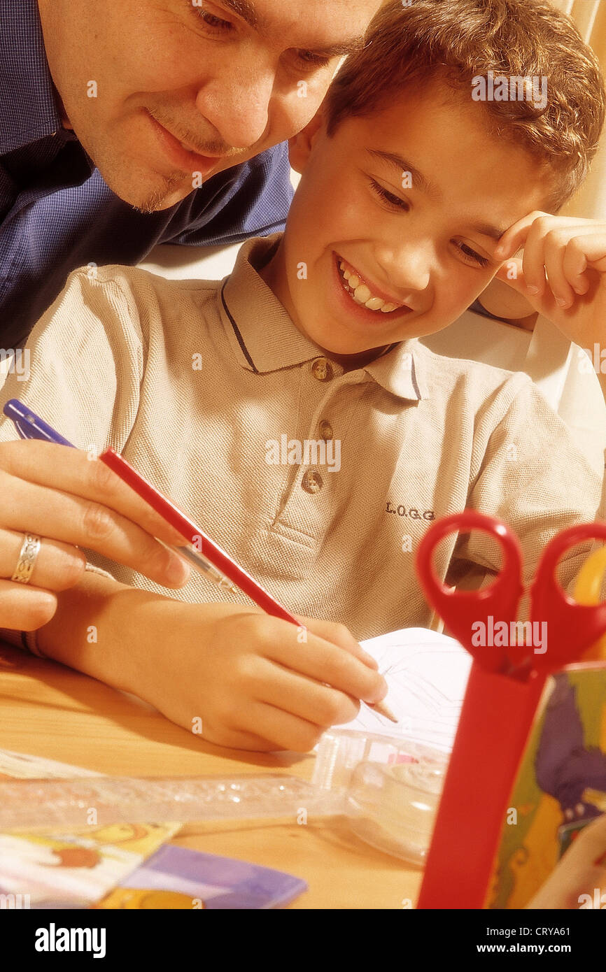 CHILD DOING HOMEWORK Stock Photo - Alamy