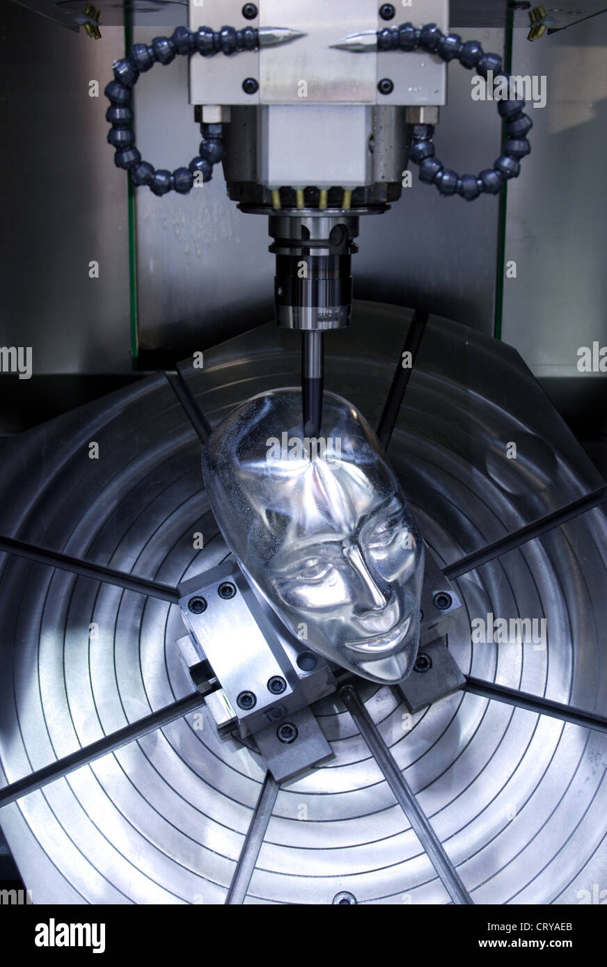 A milling machine produces the image of a human head Stock Photo - Alamy
