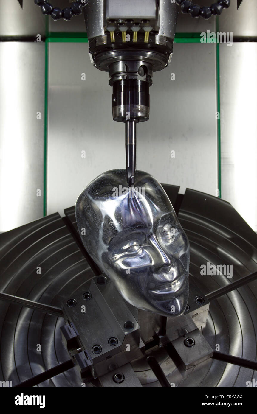 A milling machine produces the image of a human head Stock Photo - Alamy