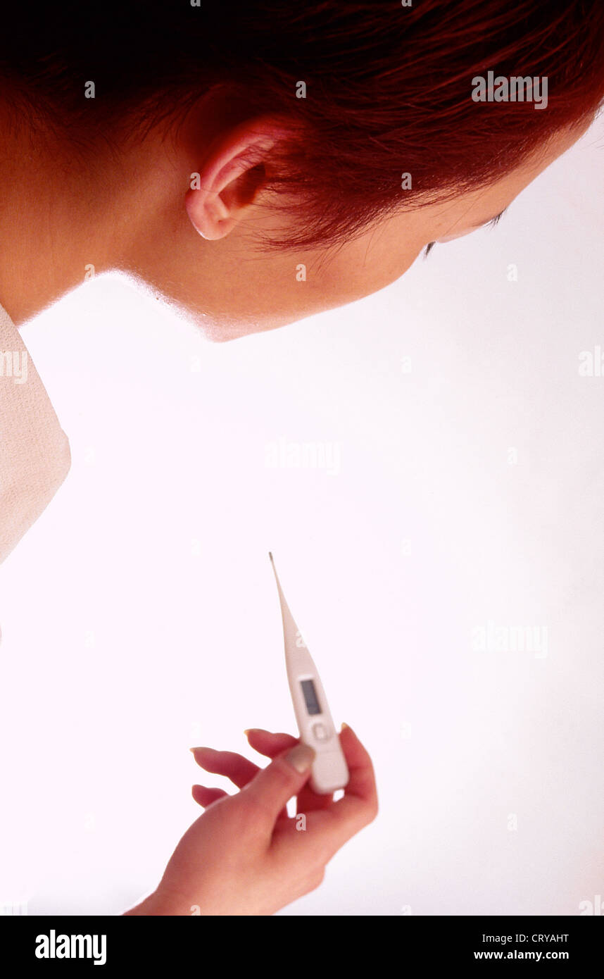 WOMAN WITH FEVER Stock Photo - Alamy