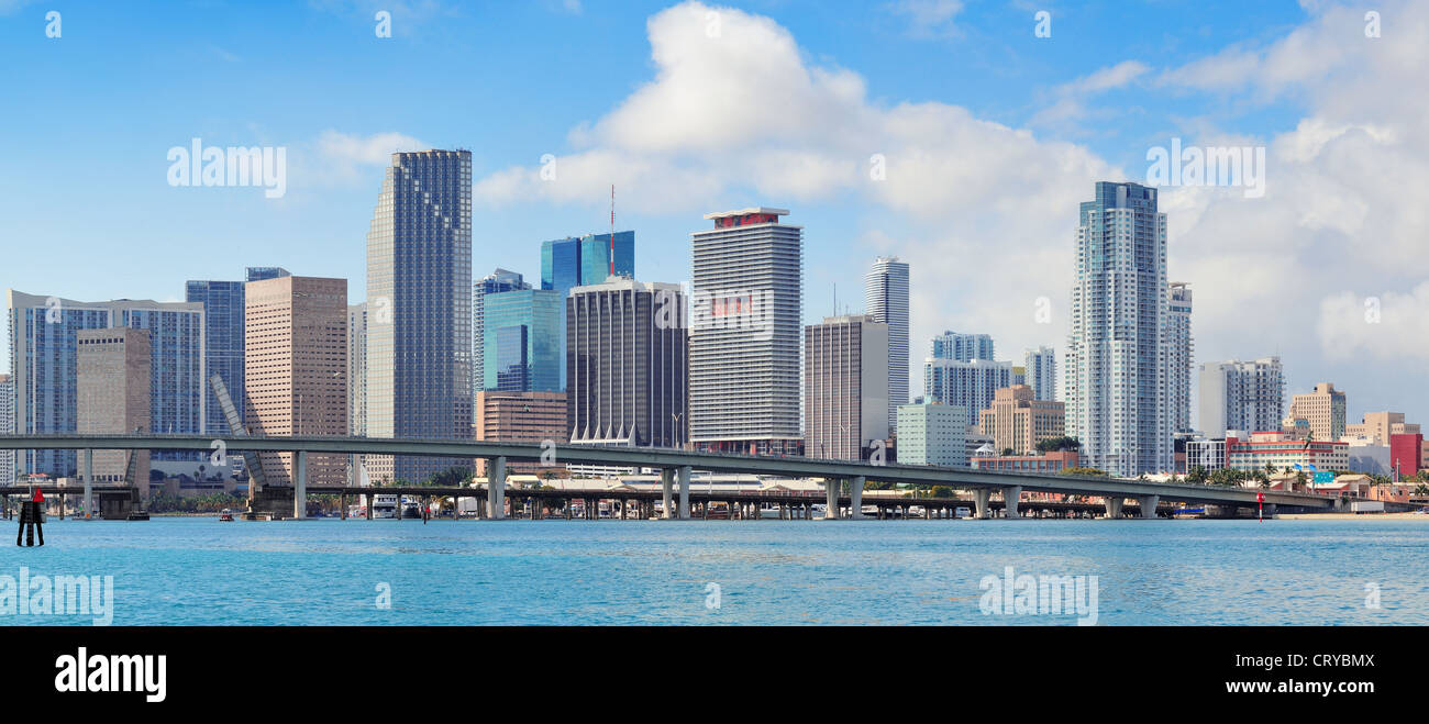 Miami skyscrapers with bridge over sea in the day Stock Photo - Alamy