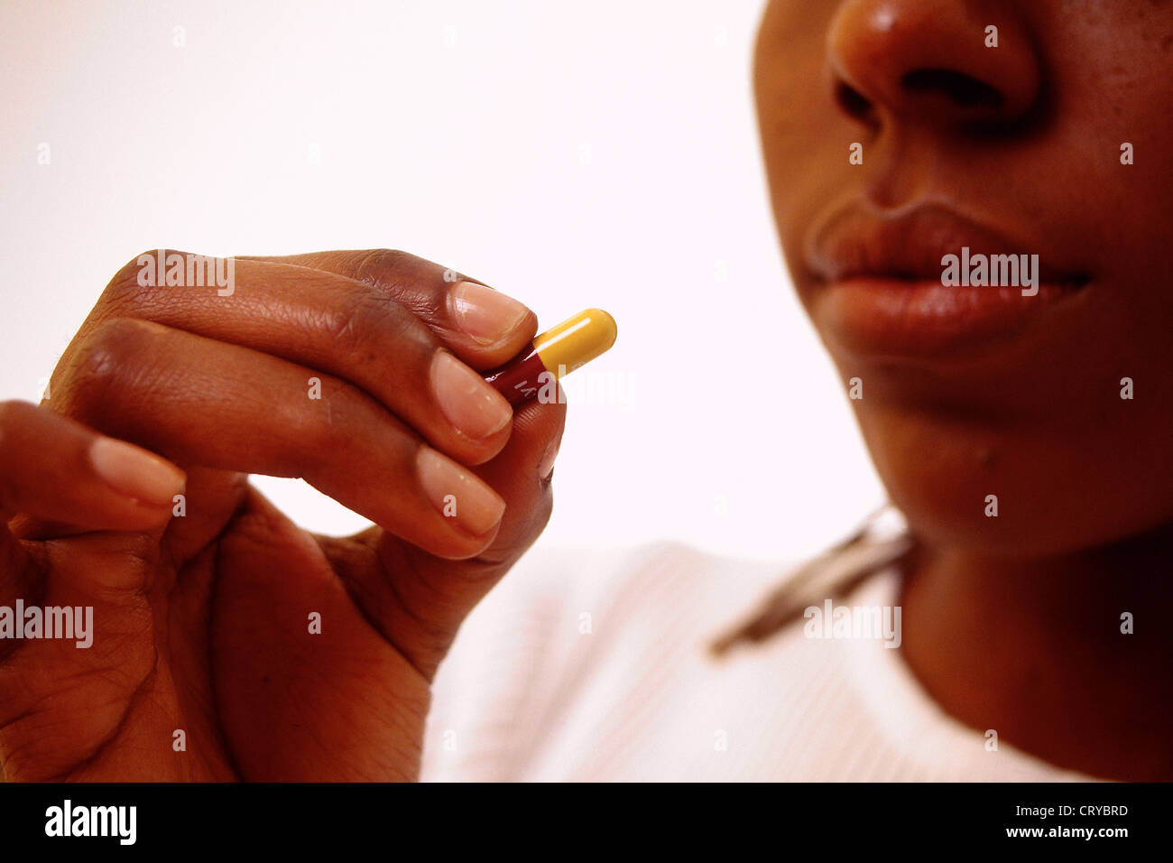 WOMAN TAKING MEDICATION Stock Photo - Alamy