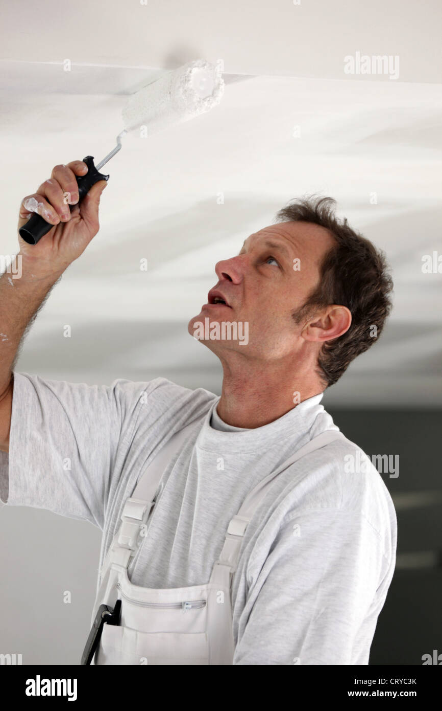 Painter repainting ceiling hi-res stock photography and images - Alamy