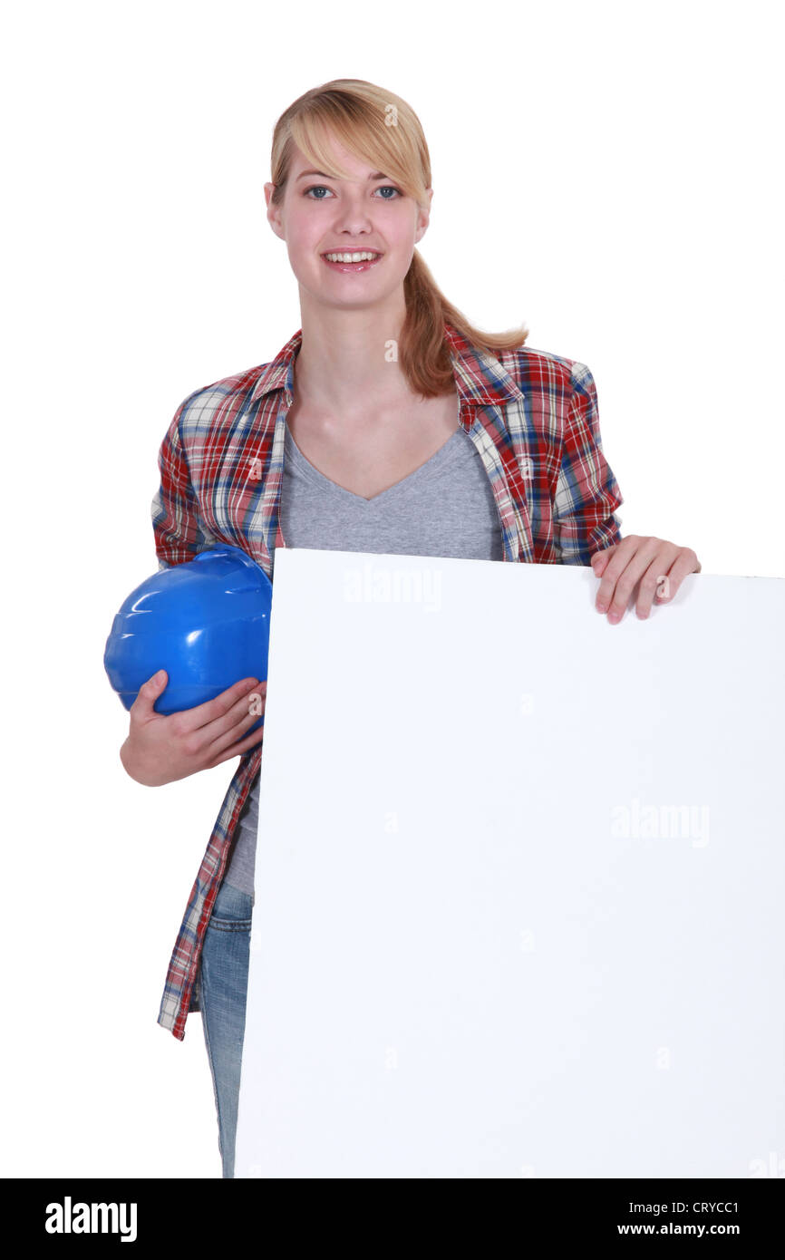 Woman with a hard hat and a blank board Stock Photo - Alamy