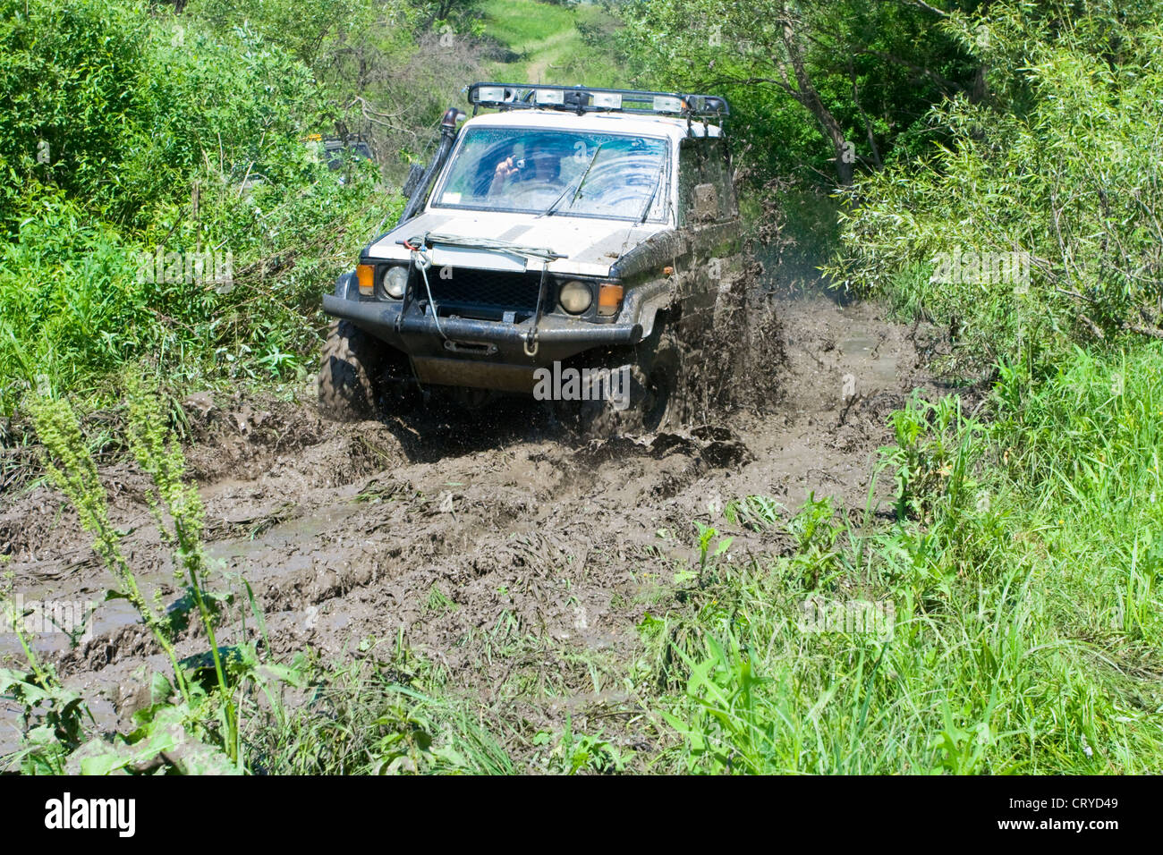 off-road driving on dirt. spray of dirt Stock Photo - Alamy