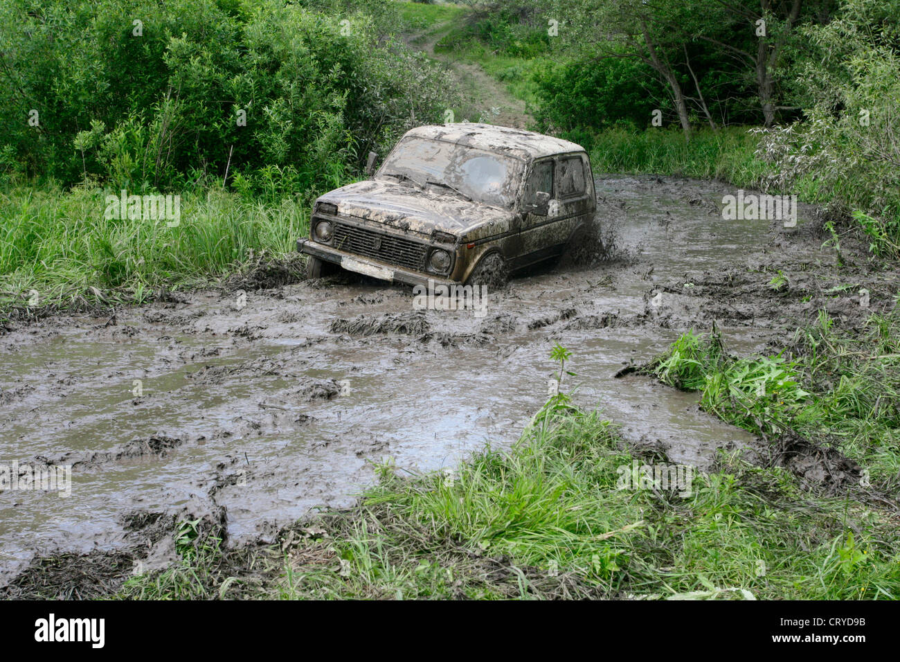 off-road driving on dirt. spray of dirt Stock Photo - Alamy