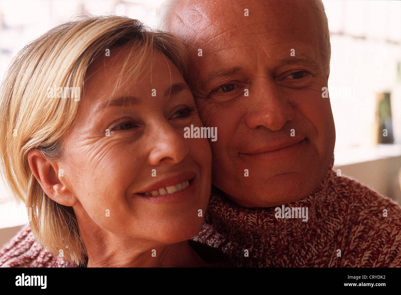 COUPLE IN THEIR 50S, INSIDE Stock Photo - Alamy