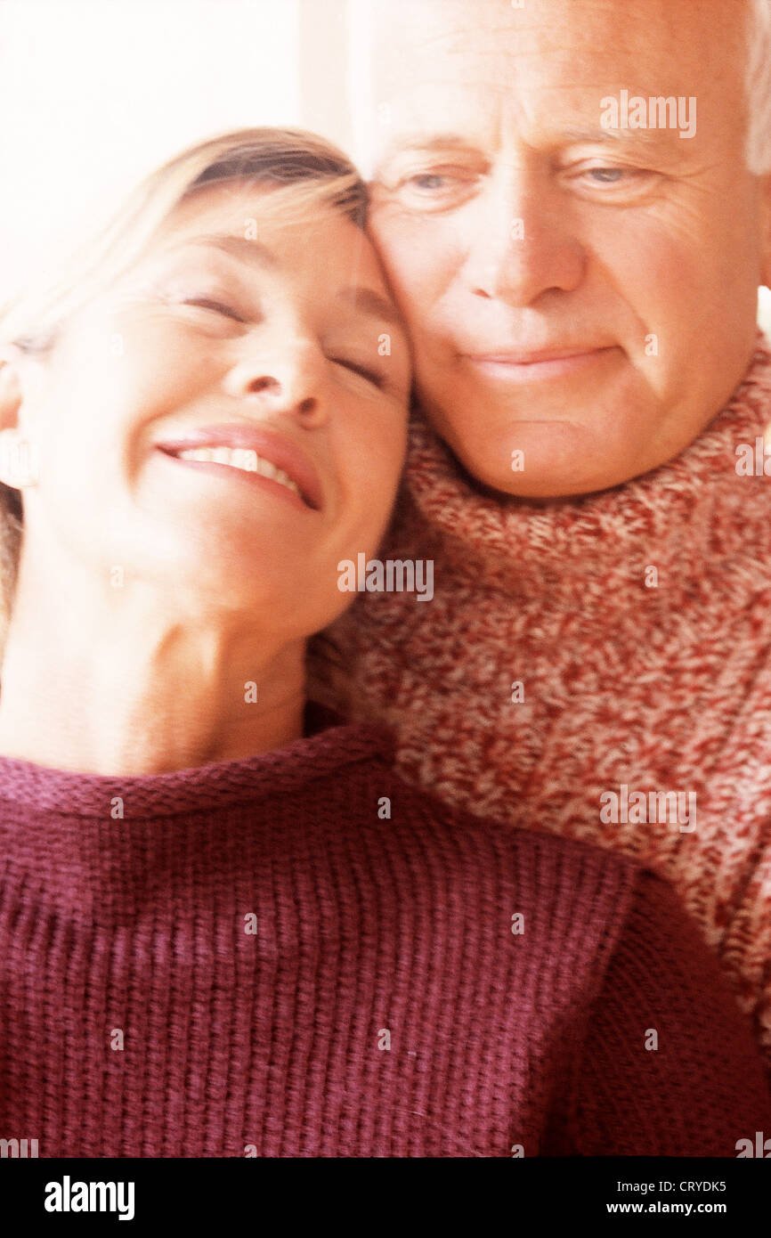 COUPLE IN THEIR 50S, INSIDE Stock Photo - Alamy