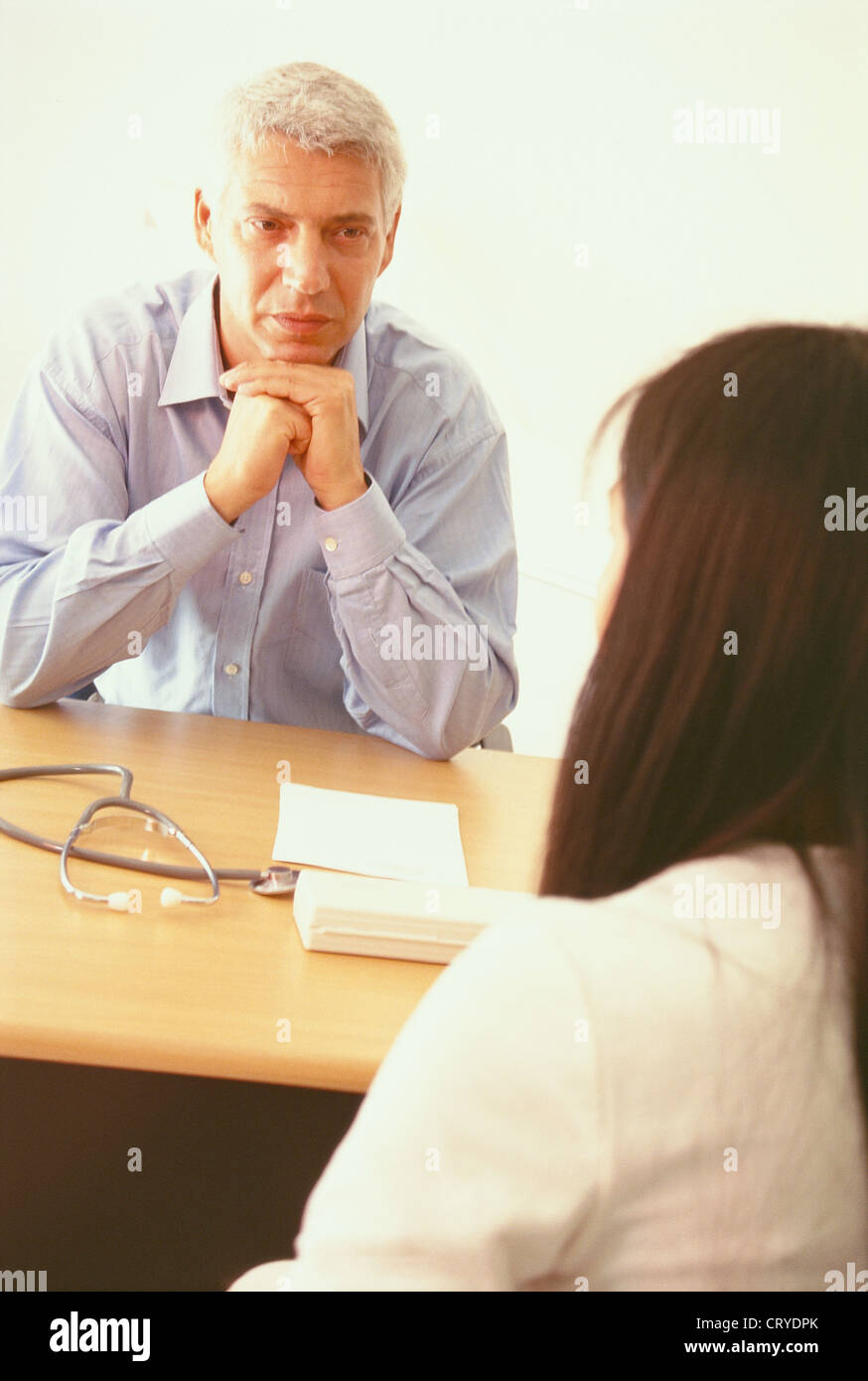 WOMAN IN CONSULTATION Stock Photo - Alamy