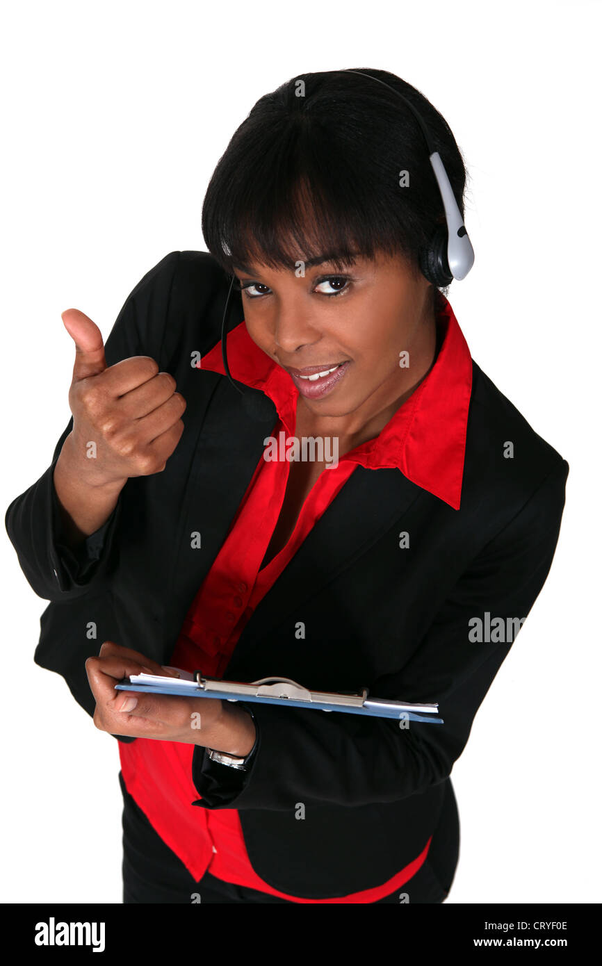 Call-center worker giving thumbs-up Stock Photo - Alamy