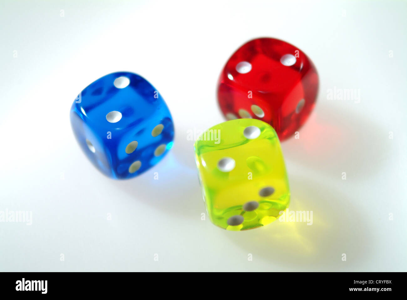 three different colored dice with two's Pasch Stock Photo - Alamy