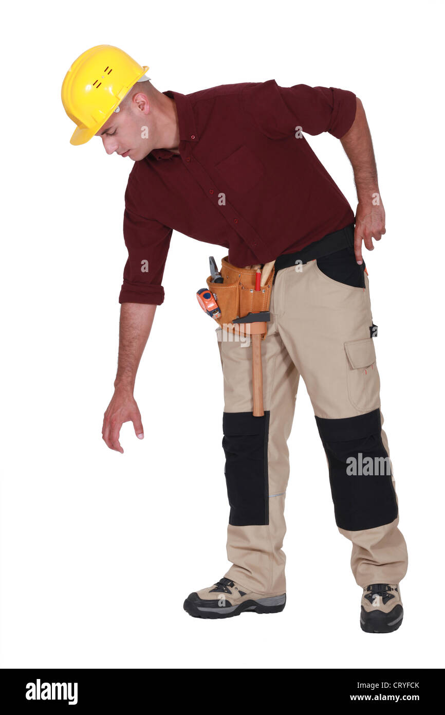 Construction worker reaching down to empty copyspace Stock Photo - Alamy