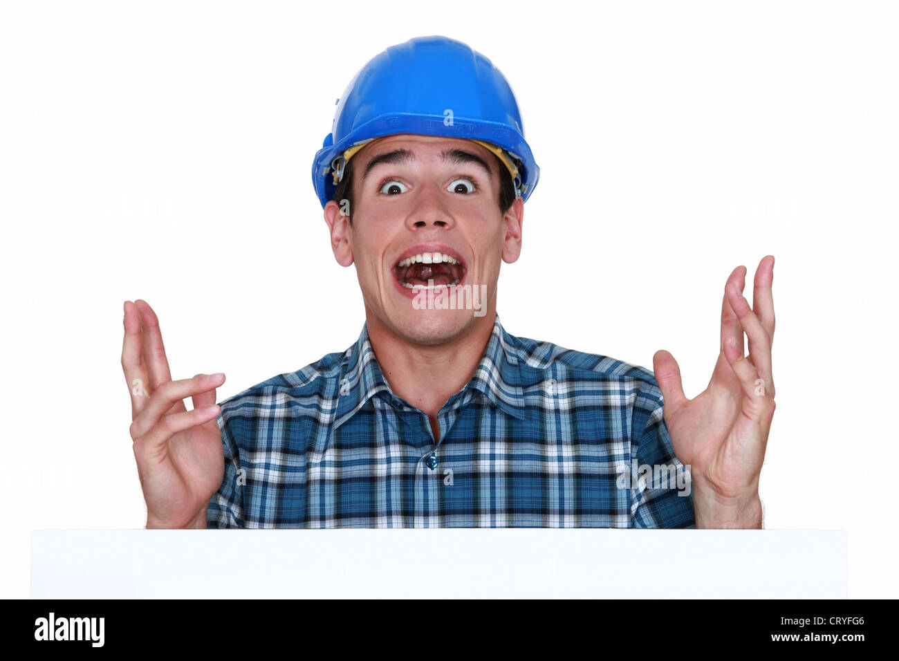surprised craftsman screaming Stock Photo - Alamy