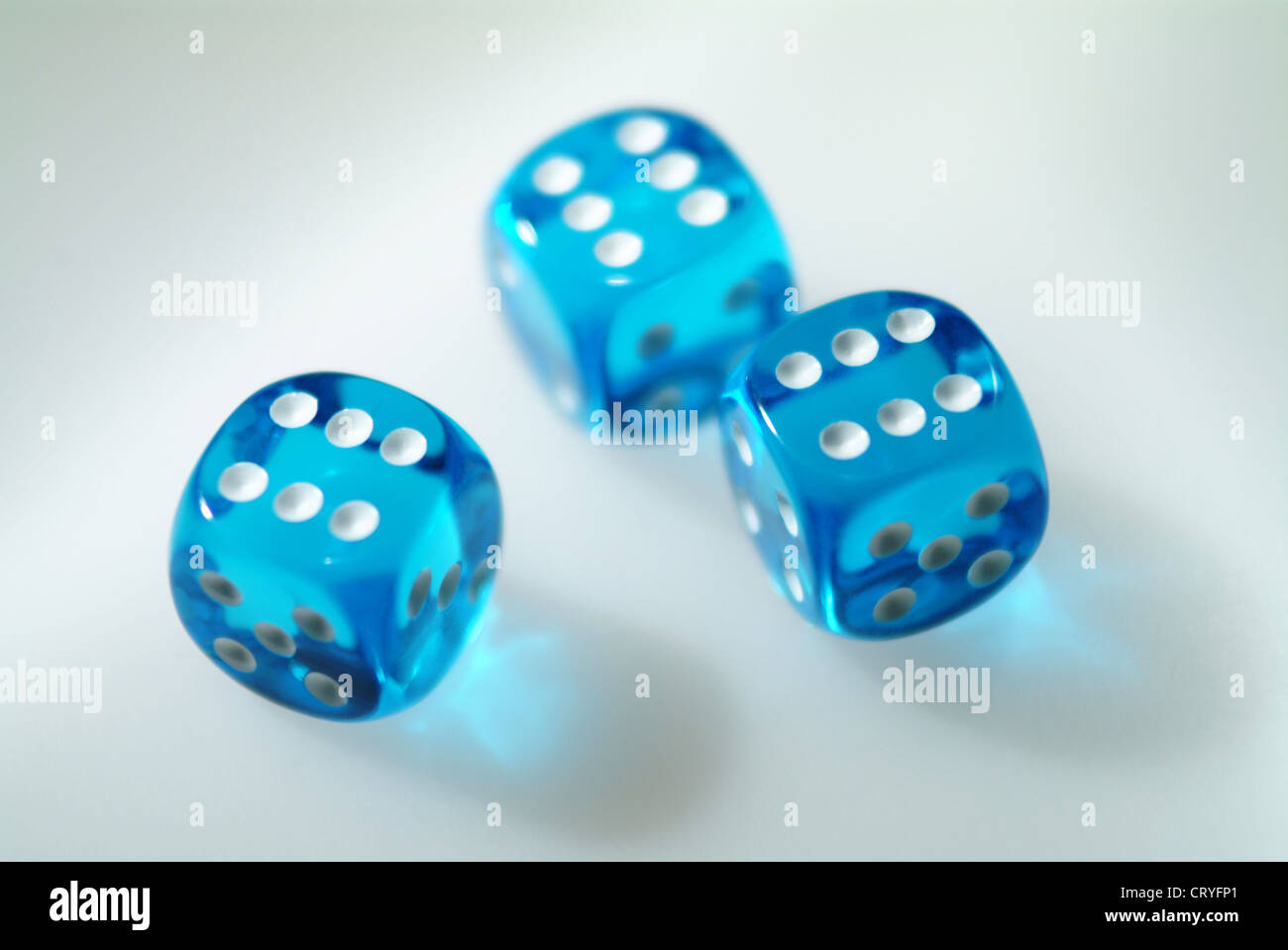 three blue dice with six-Pasch Stock Photo - Alamy