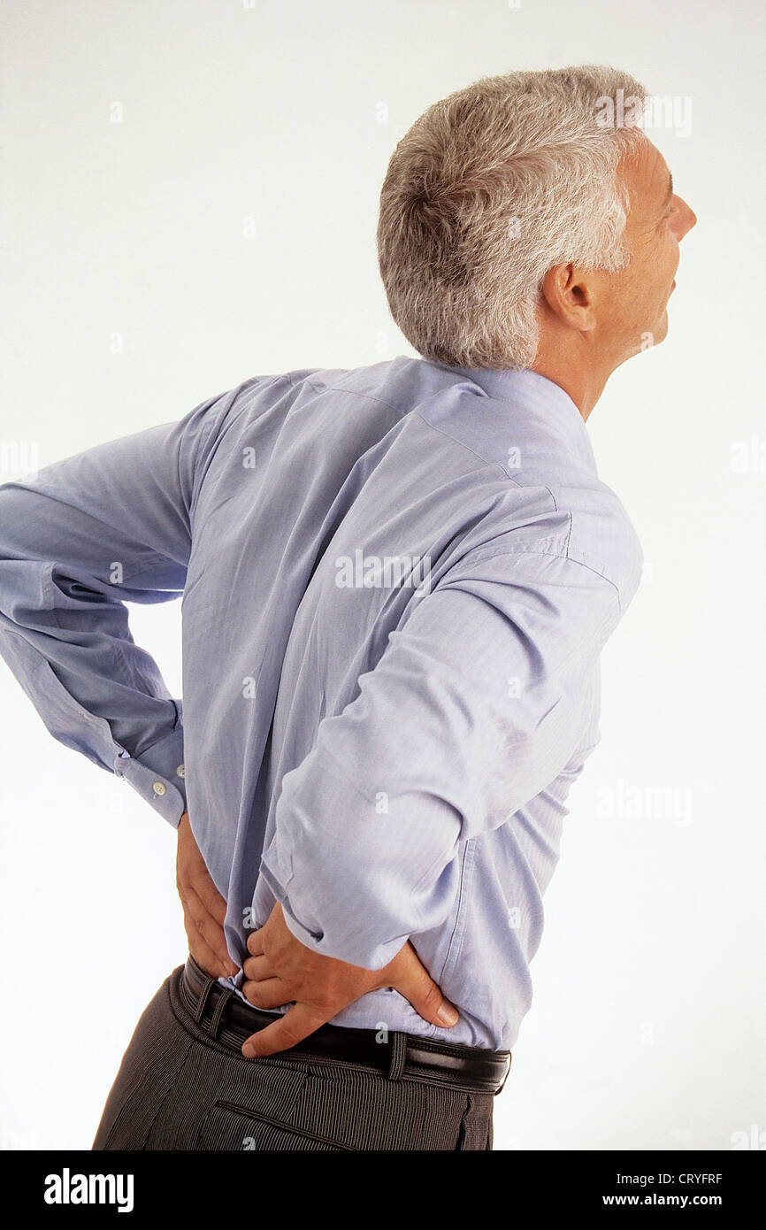 BACK PAIN IN A MAN Stock Photo - Alamy