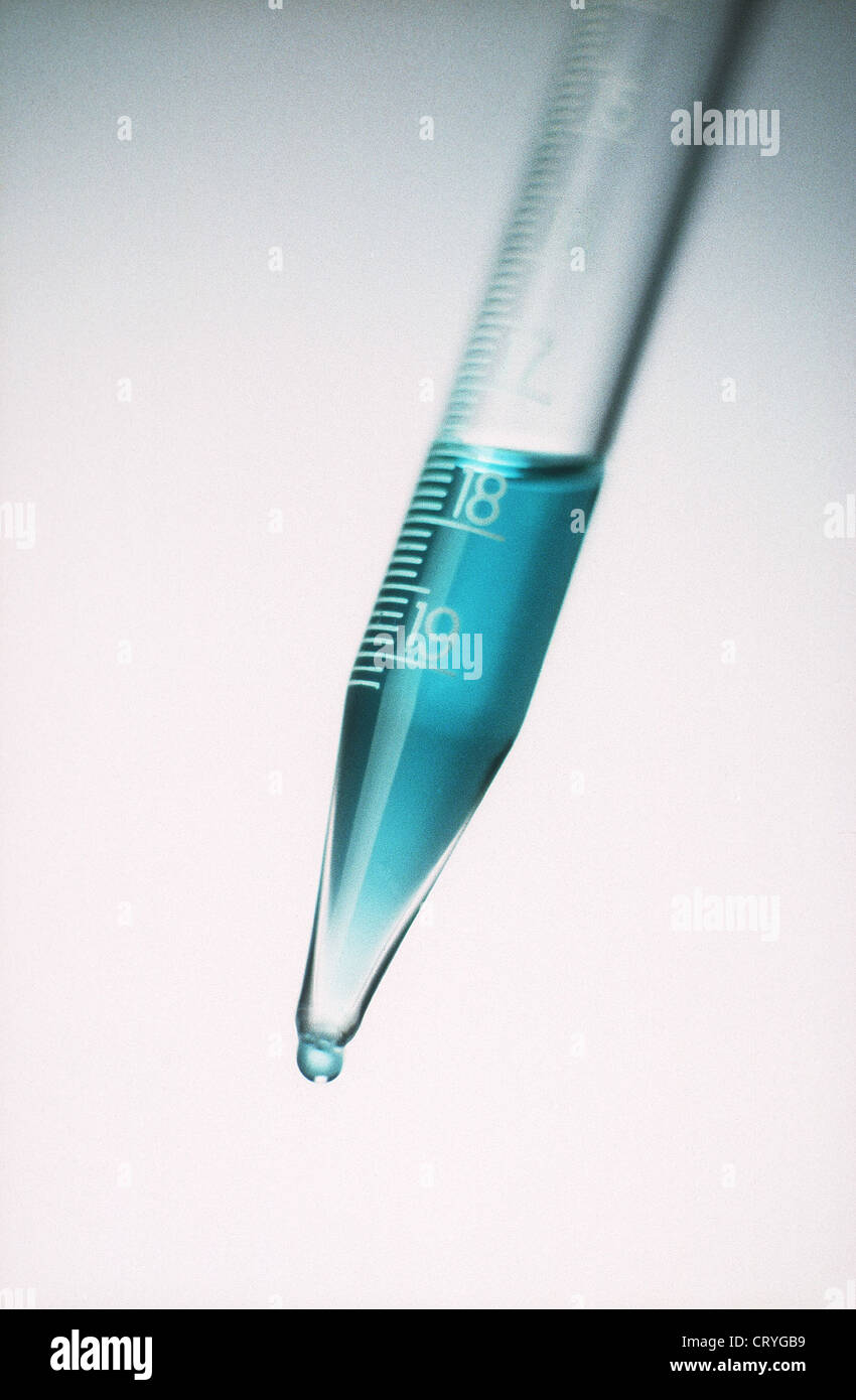 Pipette with Blue Liquid Stock Photo - Alamy