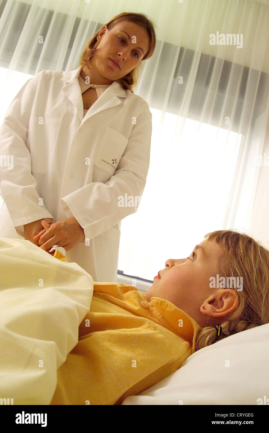 CHILD HOSPITAL PATIENT W. DOCTOR Stock Photo - Alamy