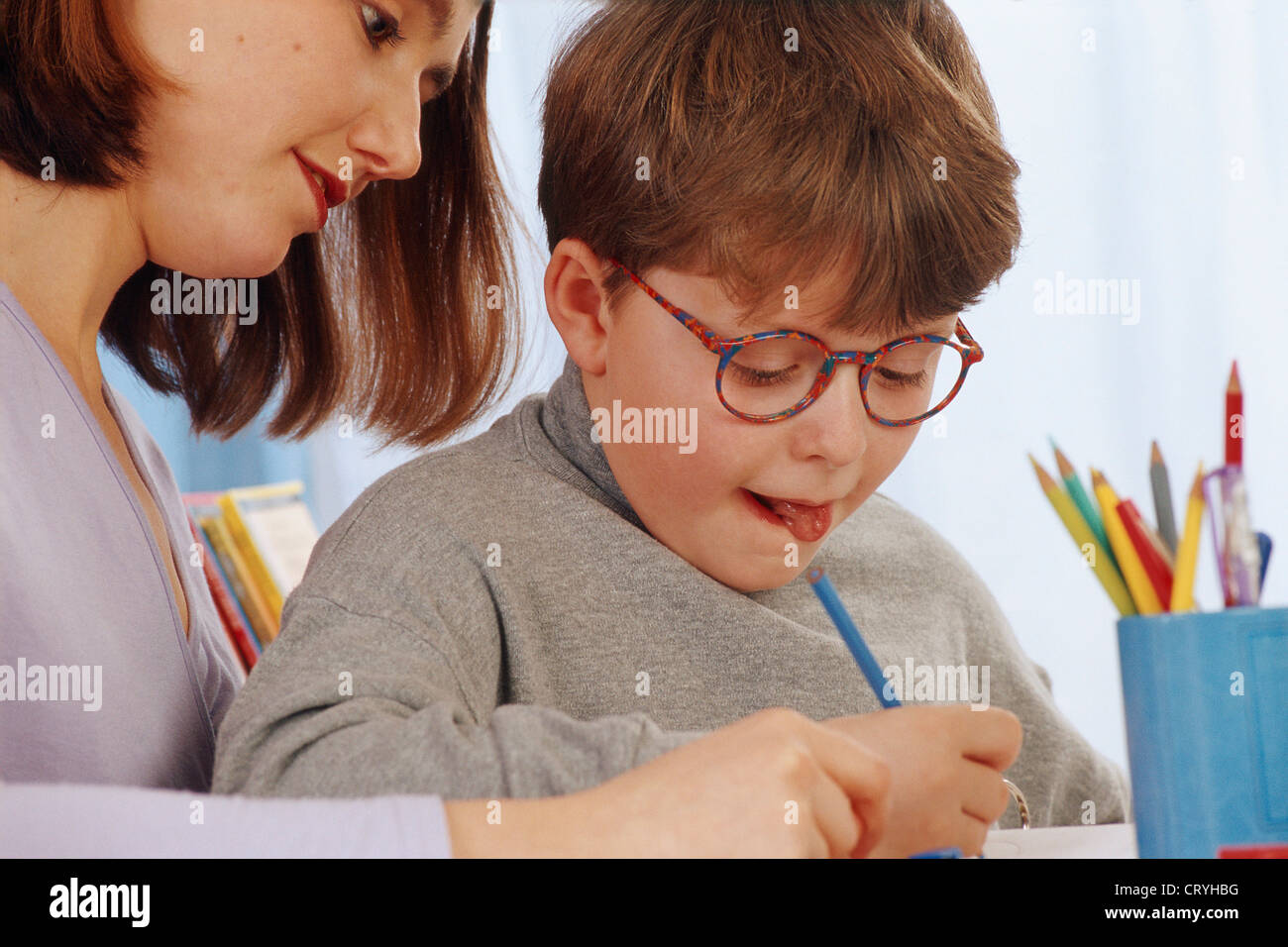 CHILD DOING HOMEWORK Stock Photo - Alamy