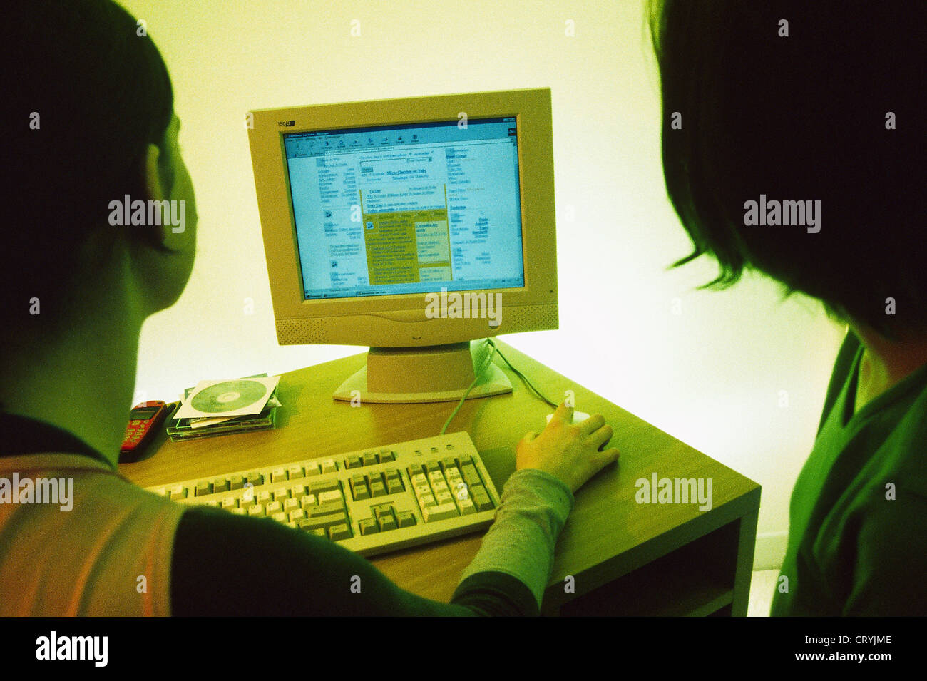 TEENAGER AT A COMPUTER Stock Photo - Alamy