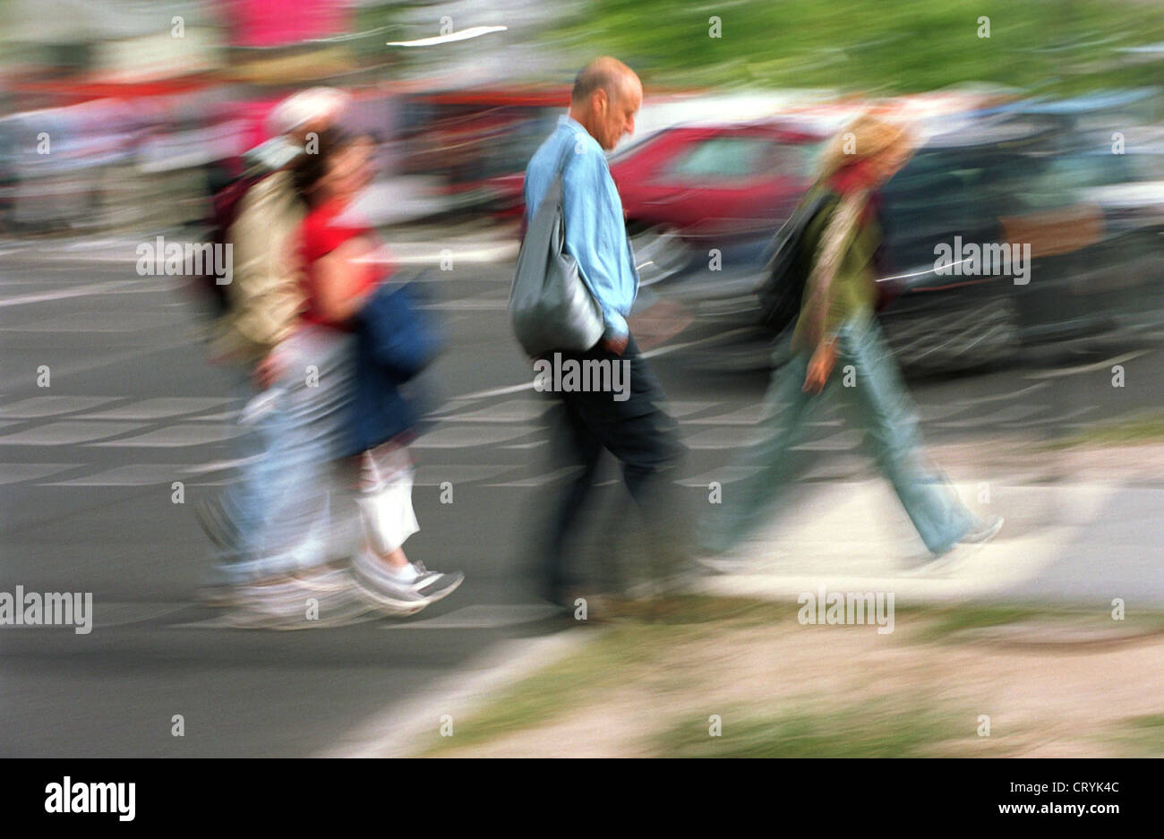 A man walks slower than the other Stock Photo - Alamy