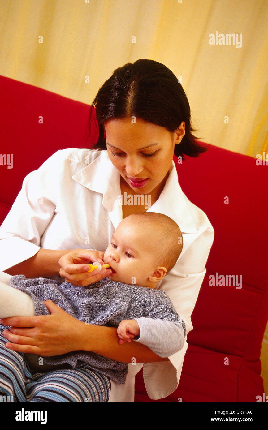 INFANT TAKING MEDICATION Stock Photo - Alamy
