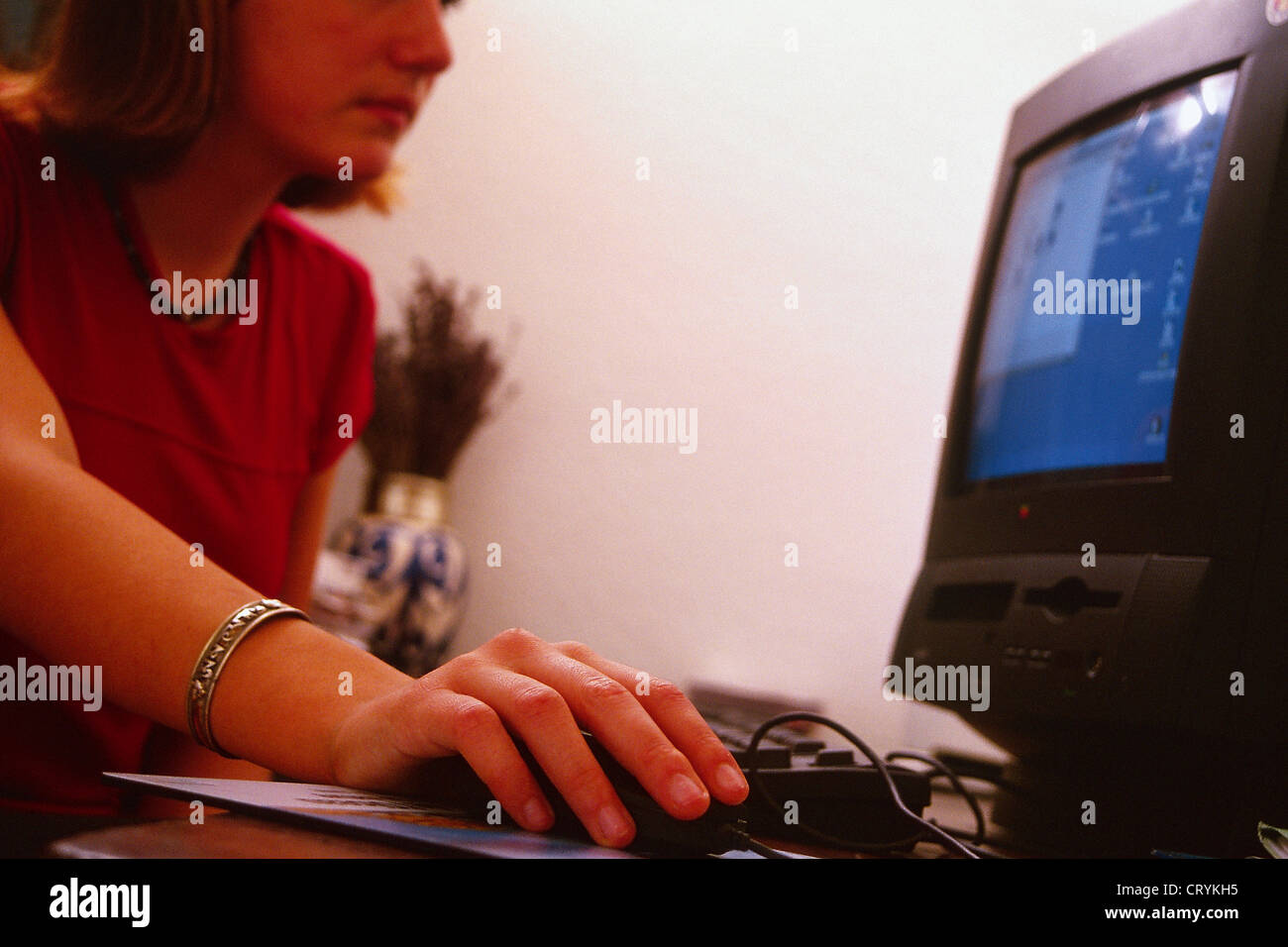 TEENAGER AT A COMPUTER Stock Photo - Alamy