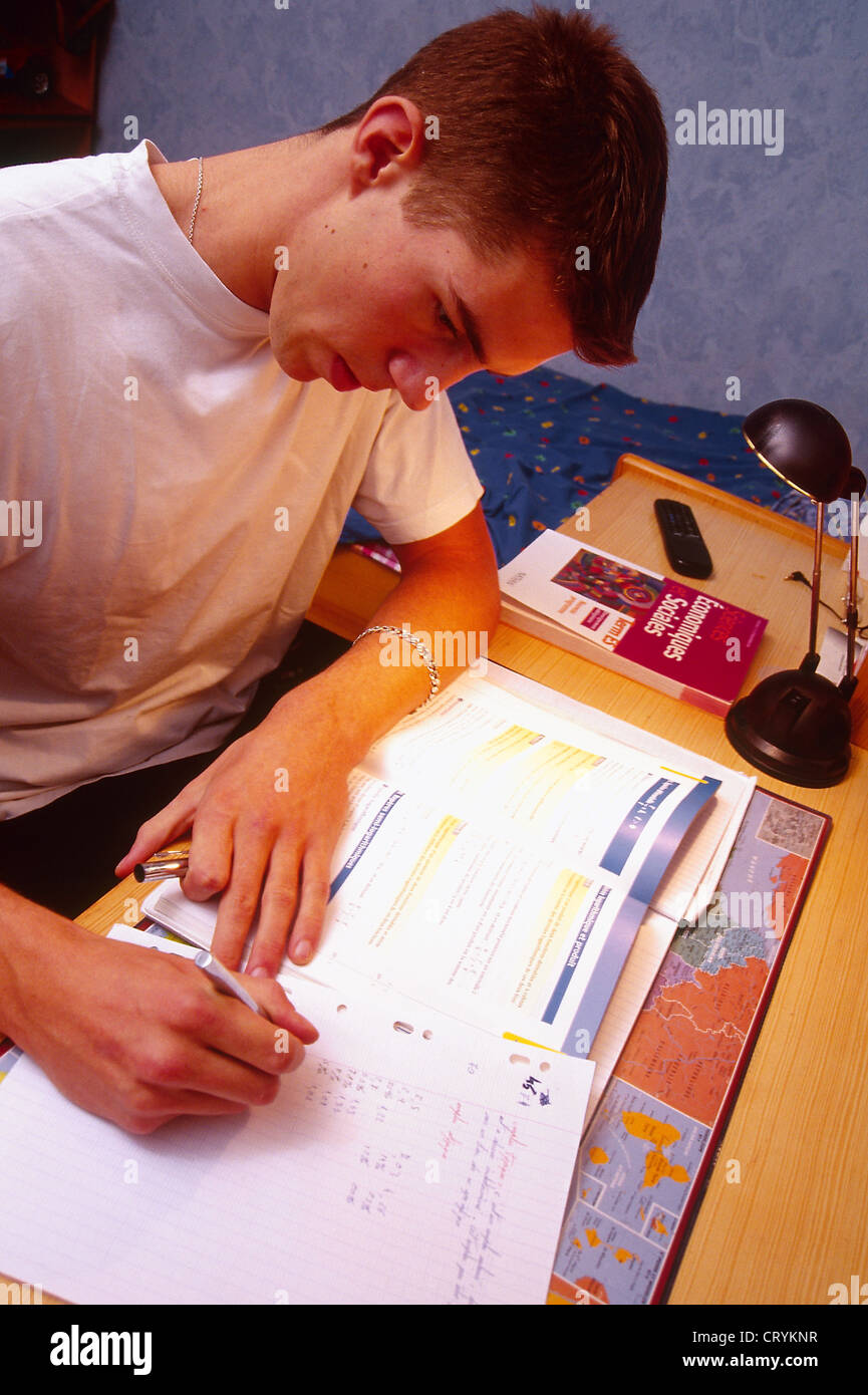 TEENAGER DOING HOMEWORK Stock Photo - Alamy