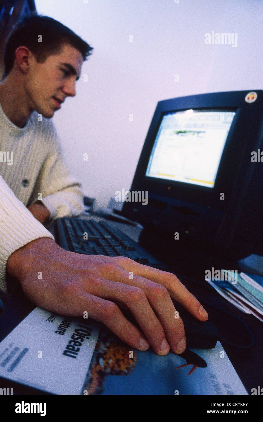 TEENAGER AT A COMPUTER Stock Photo - Alamy