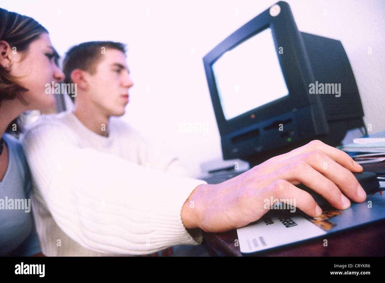 TEENAGER AT A COMPUTER Stock Photo - Alamy