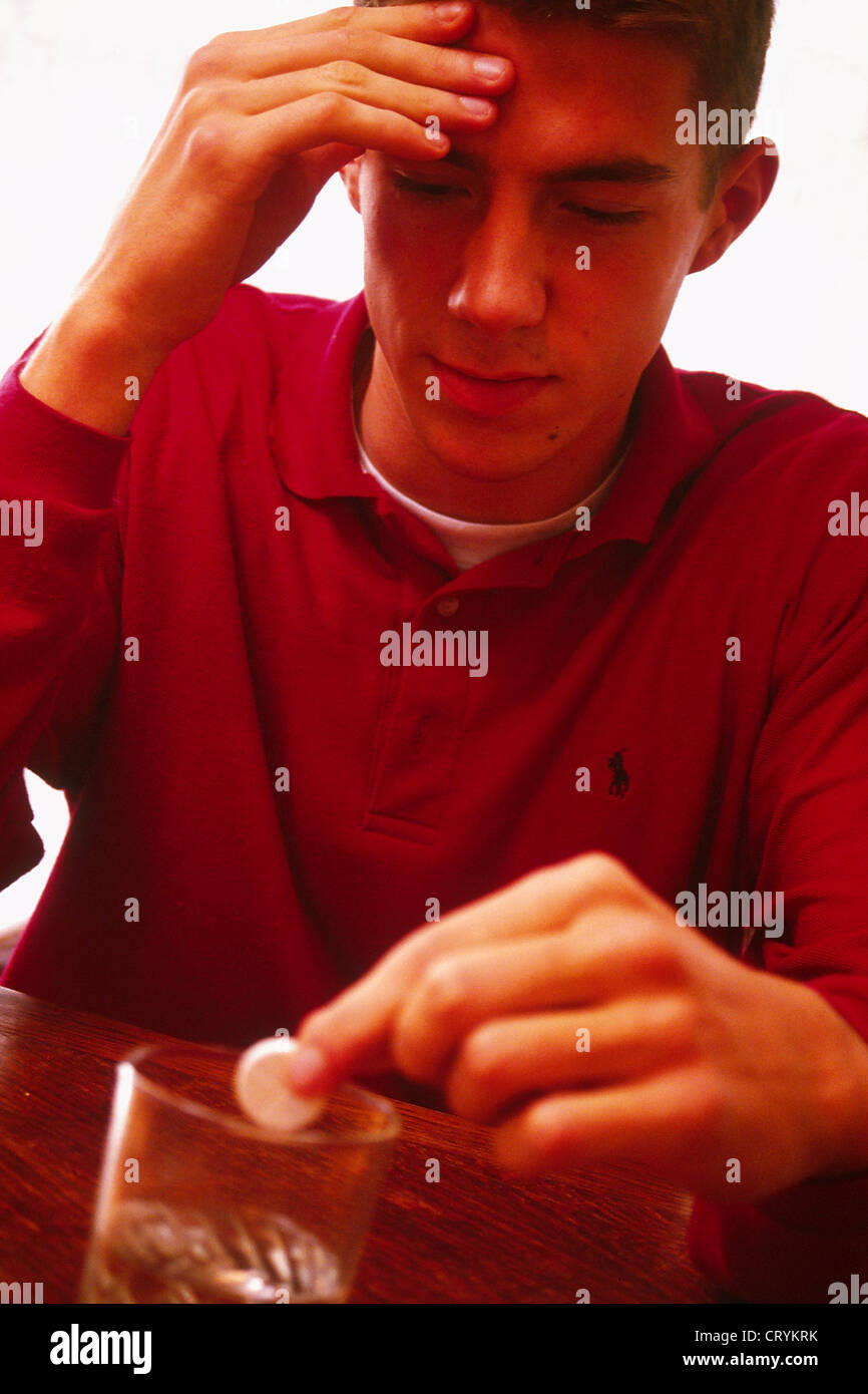 ADOLESCENT TAKING MEDICATION Stock Photo - Alamy
