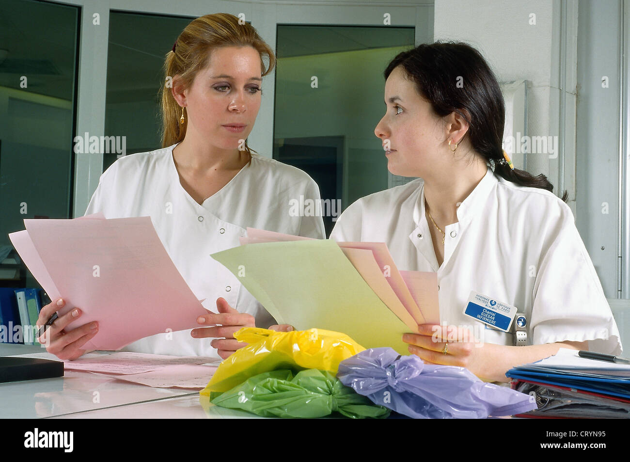 NURSE WITH PATIENT'S RECORD Stock Photo - Alamy