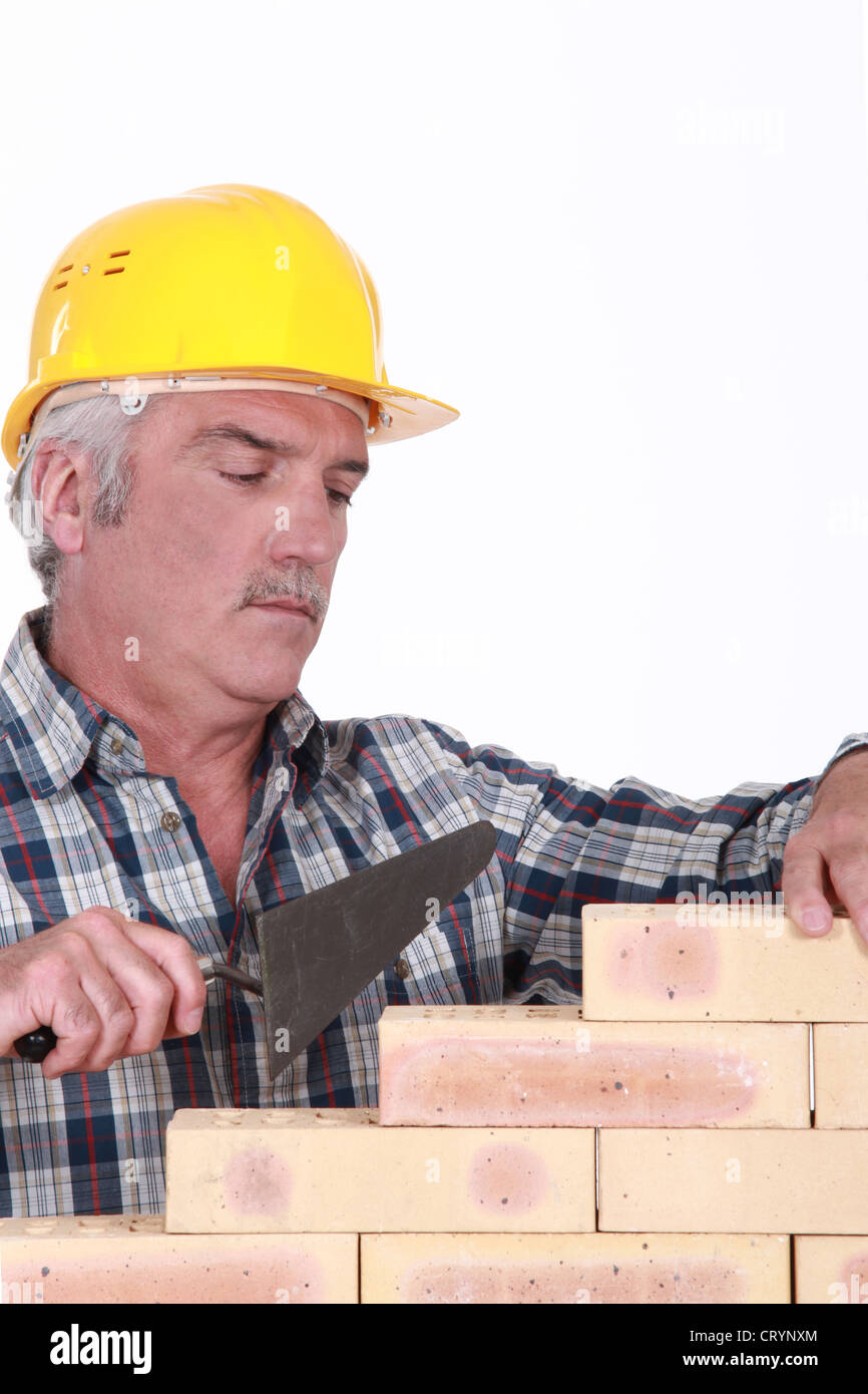 Portrait of a bricklayer Stock Photo - Alamy